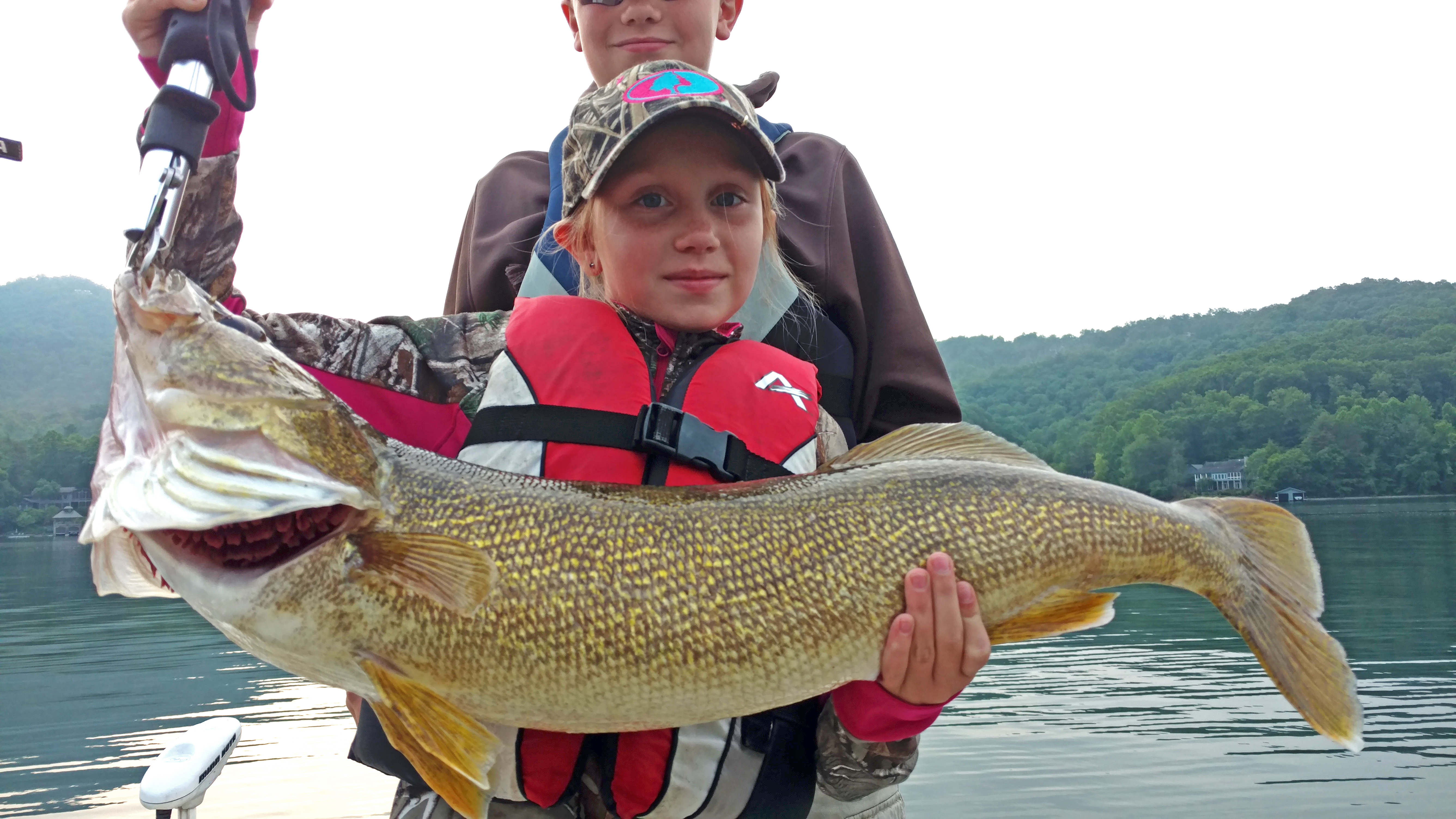girl with walleye_8lb_angleraward_lakeburton_05-27-16_adjusted ...